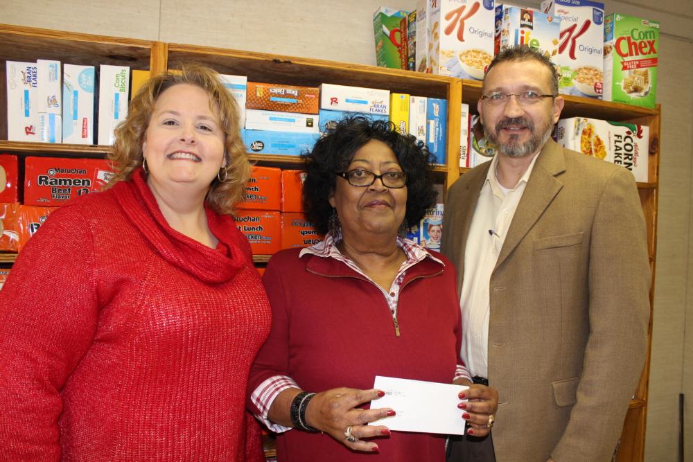Cleco gives check to Eunice Food Bank | EuniceToday Archive | The ...